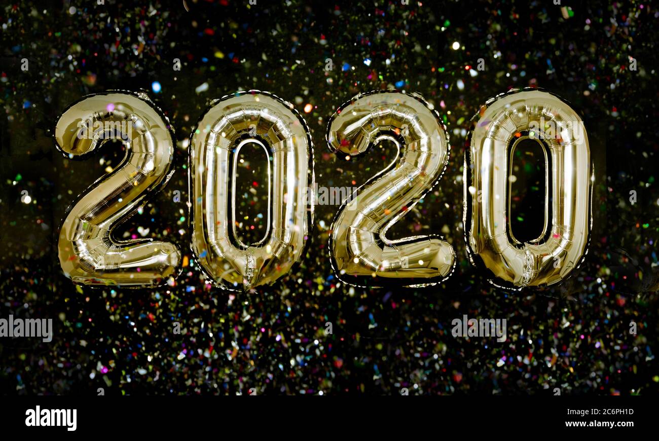 Confettis and golden balloons, new year 2020 celebration Stock Photo ...