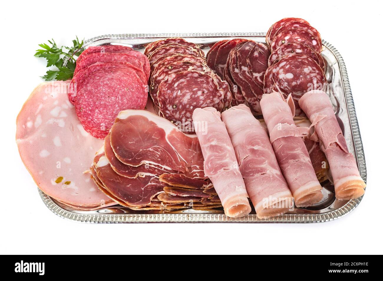 tray of cooked meats in front of white background Stock Photo - Alamy