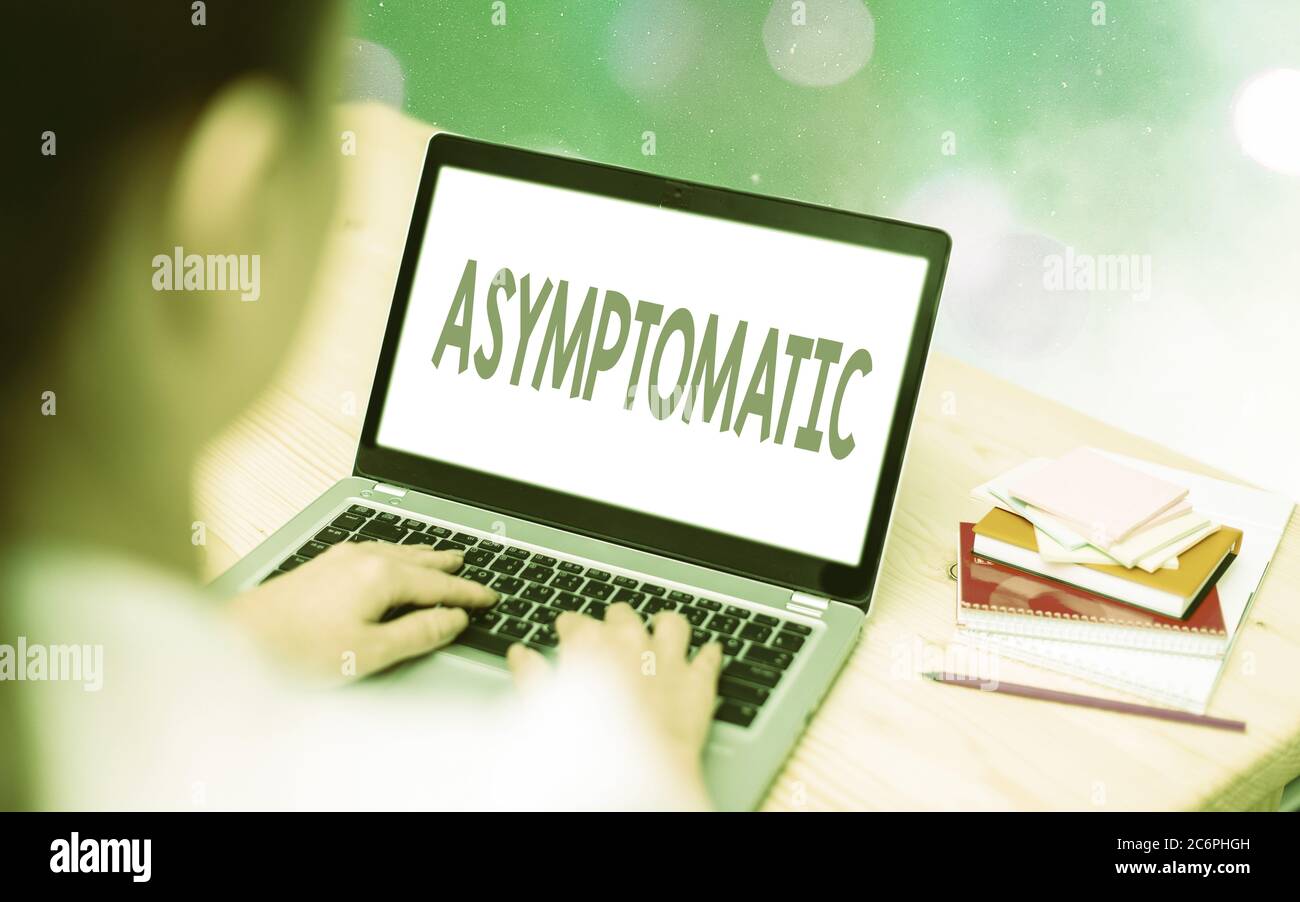 Conceptual hand writing showing Asymptomatic. Concept meaning a ...