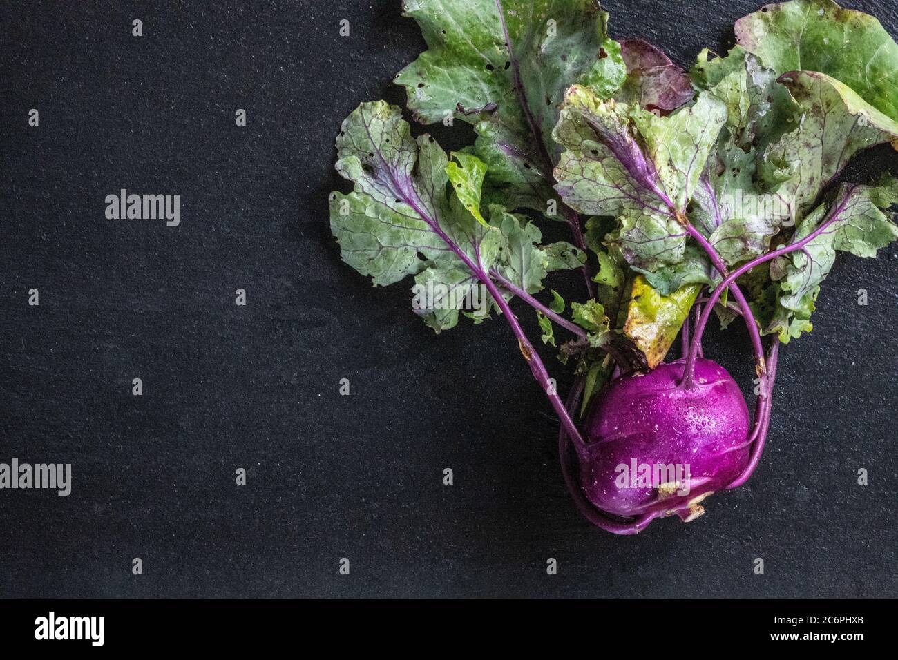 beetroot on black background Stock Photo - Alamy