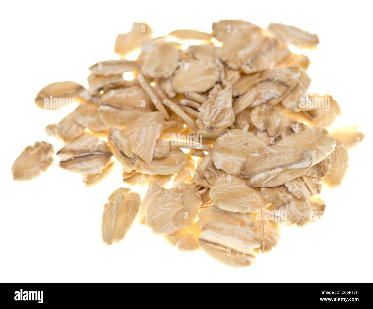 Dry oat flakes on white background Stock Photo - Alamy