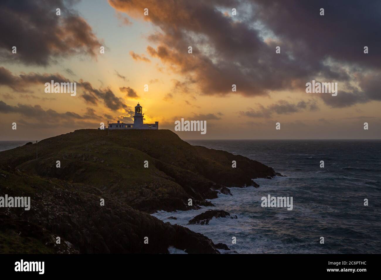 Strumble Head Lighthouse at sunset, Pembrokeshire, Wales, UK Stock ...