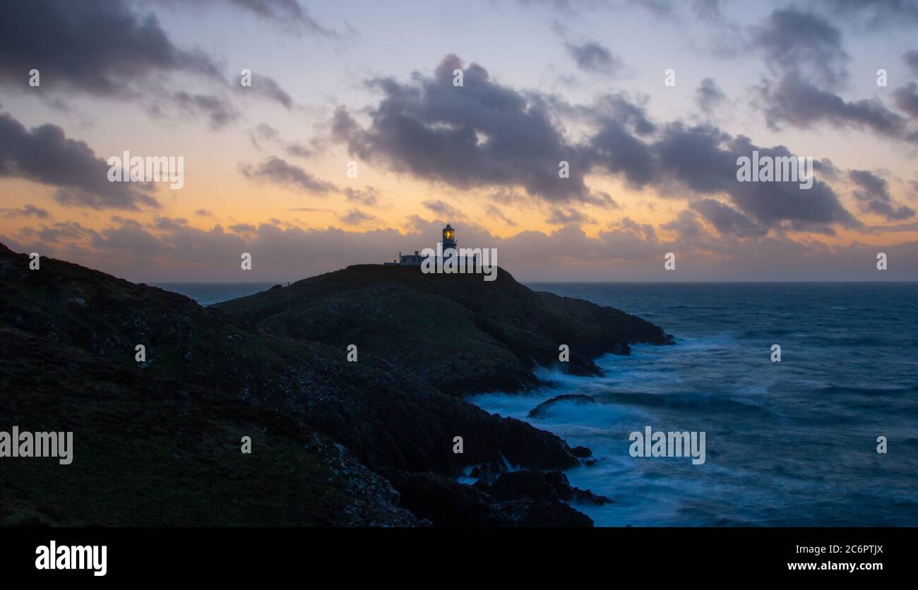 Strumble Head Lighthouse at sunset, Pembrokeshire, Wales, UK Stock ...