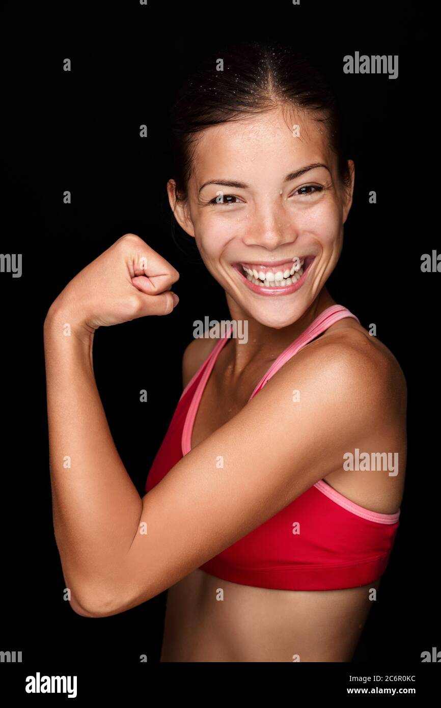 Laughing flexing muscles hi-res stock photography and images - Alamy