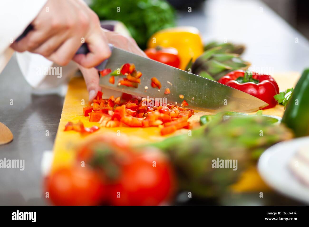 Detail of a Chef at work in his Kitchen Stock Photo - Alamy