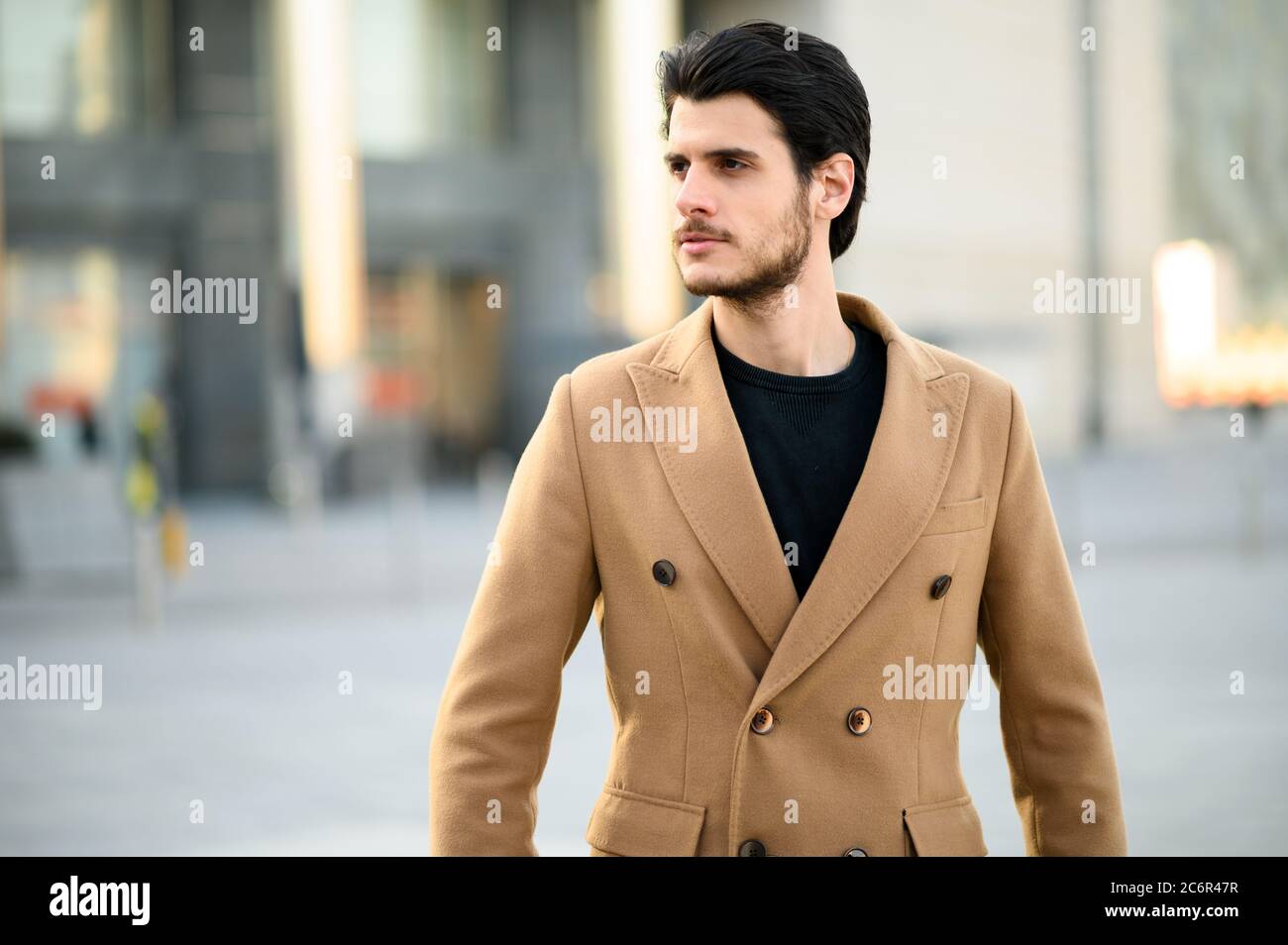 Handsome elegant man walking in the city Stock Photo - Alamy