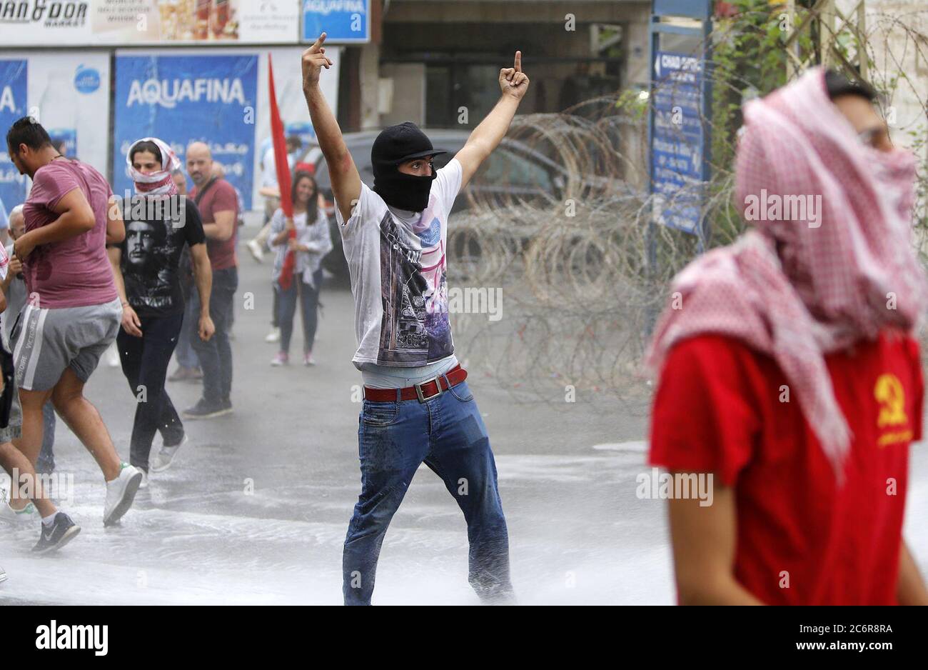 Beirut, Lebanon. 10th July, 2020. Lebanese protesters chant slogans ...