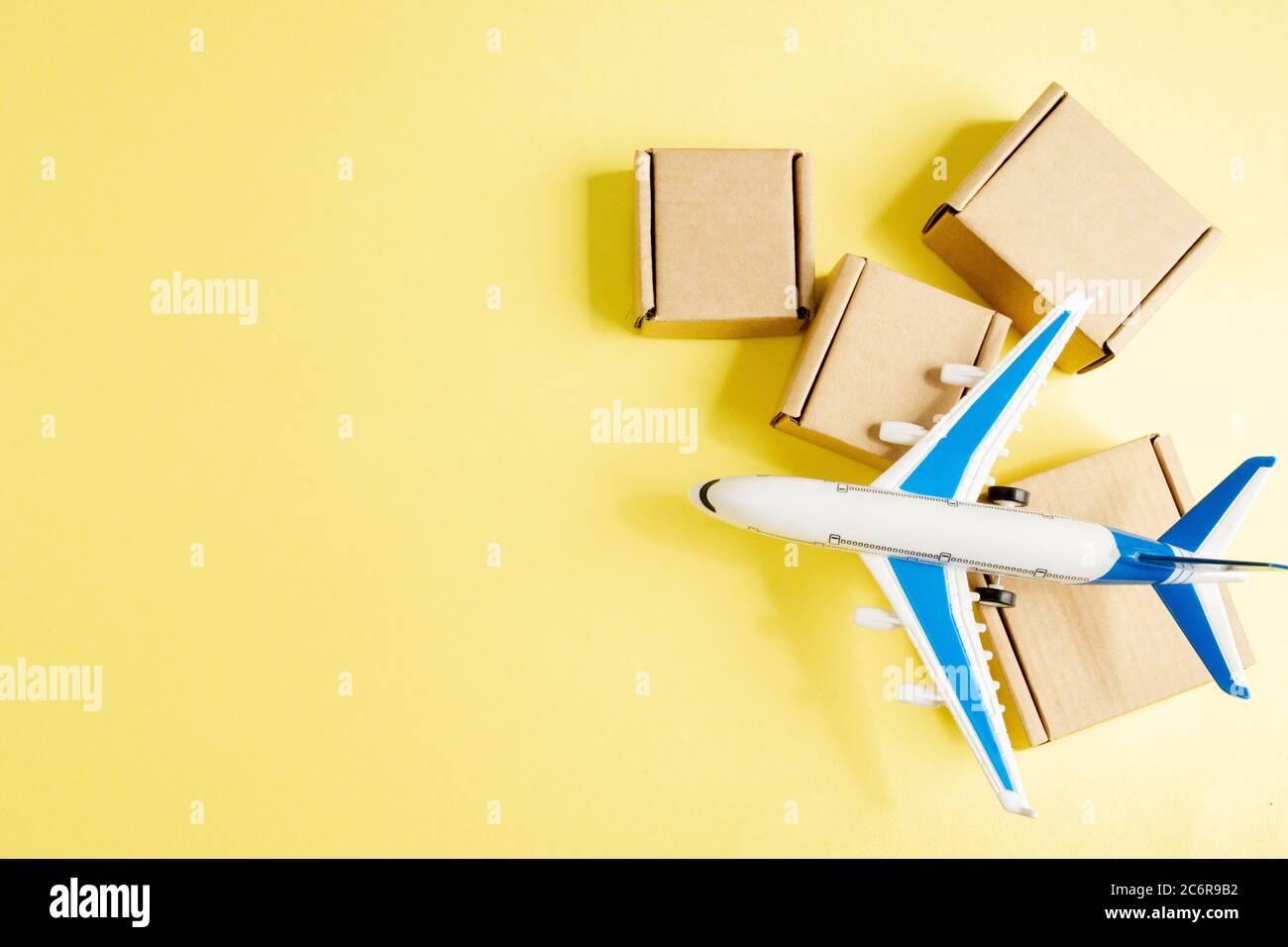Airplane and stack of cardboard boxes. concept of air cargo and parcels ...