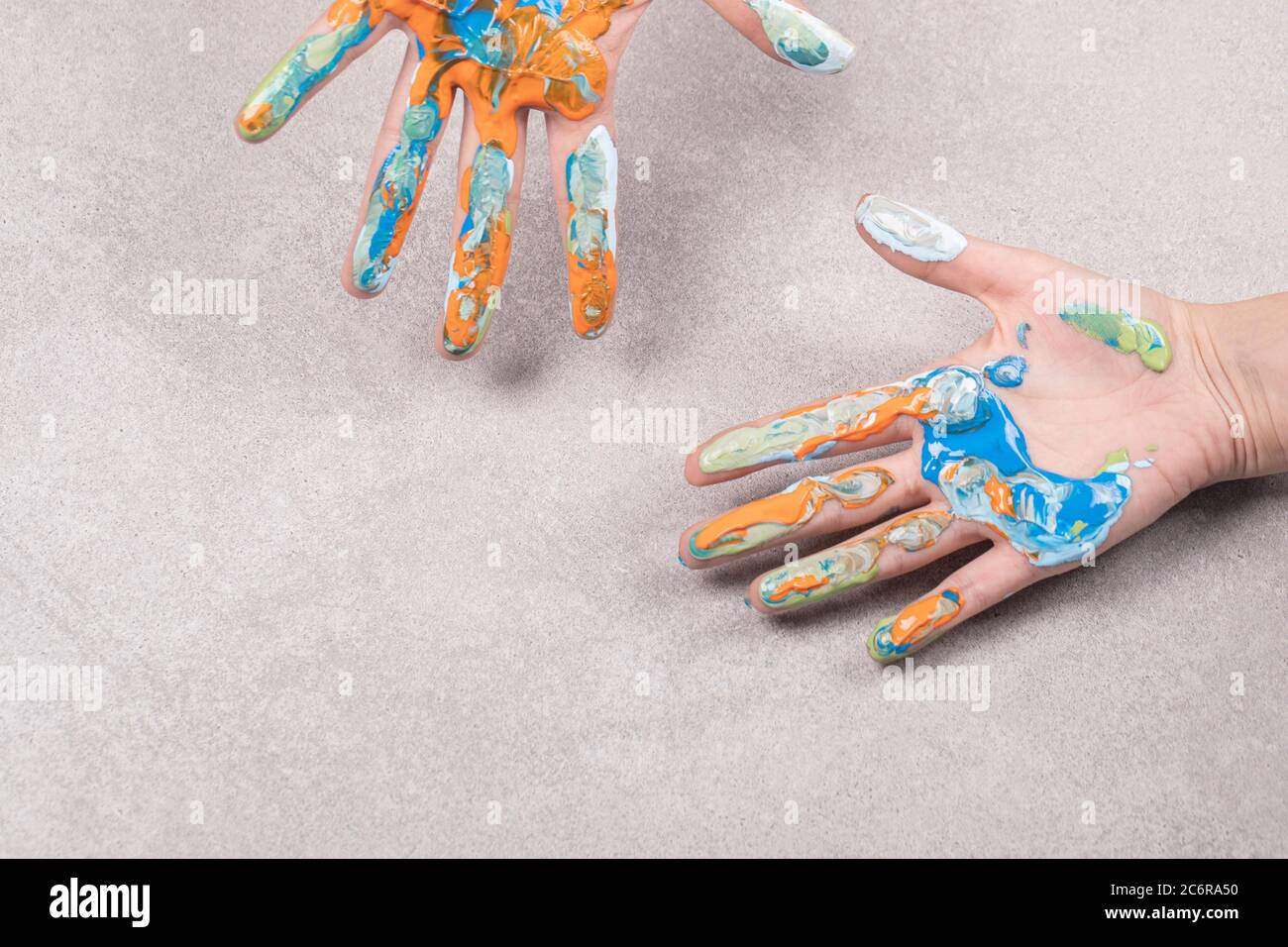 Kids hands with colorful acrylic oil mix Stock Photo - Alamy
