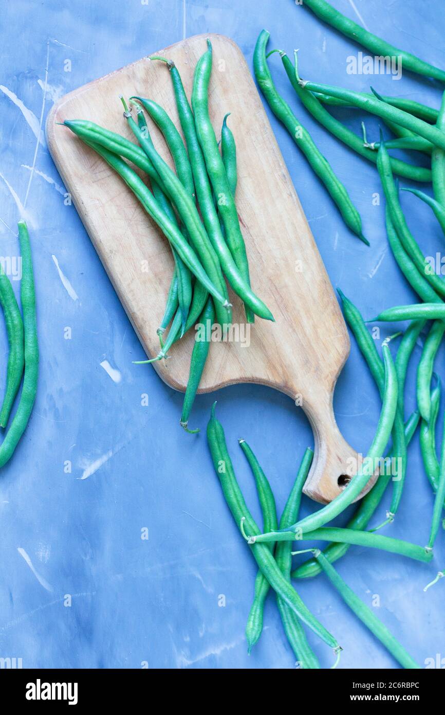 Bunch of fresh green beans on a plate. String Beans. Asparagus on ...