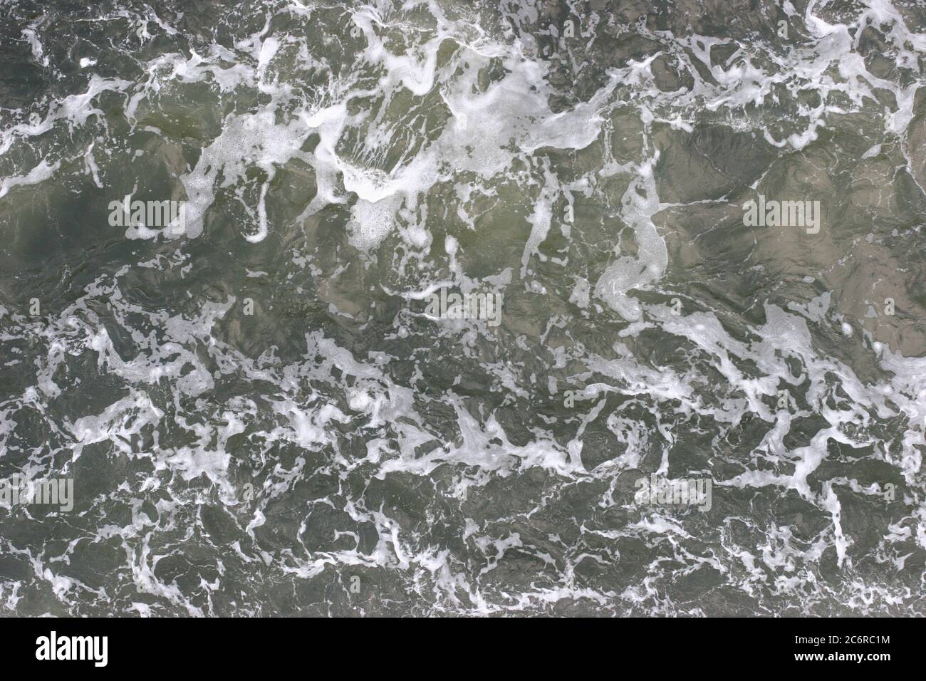 Cruise ship side thrust props when leaving port Stock Photo - Alamy