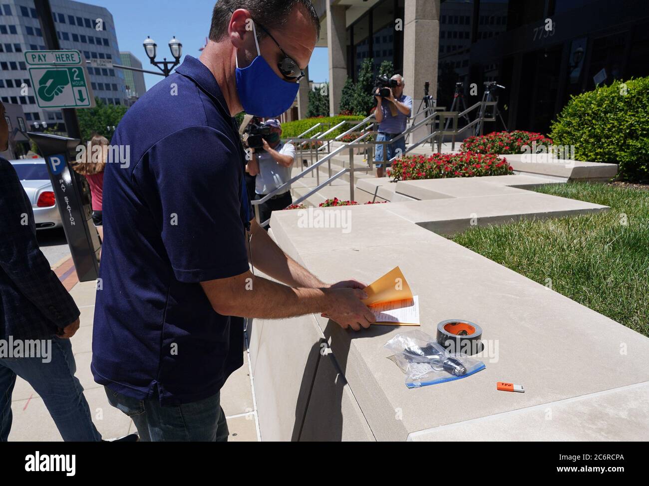 St. Louis Police produce a receipt for Al Watkins, the attorney for the ...