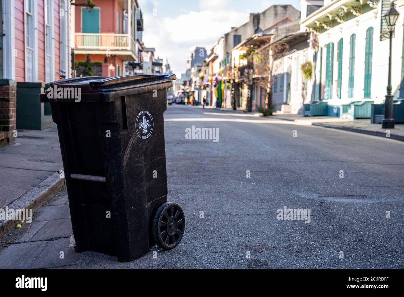New Orleans Trash Bin on empty city street Stock Photo - Alamy