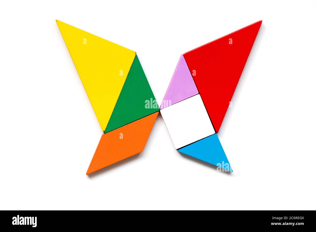 Color wood tangram puzzle in butterfly shape on white background Stock ...
