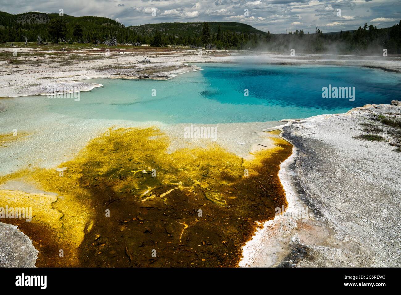 View of the Sapphire Pool in Biscuit Basin, a geyser, hot spring and ...