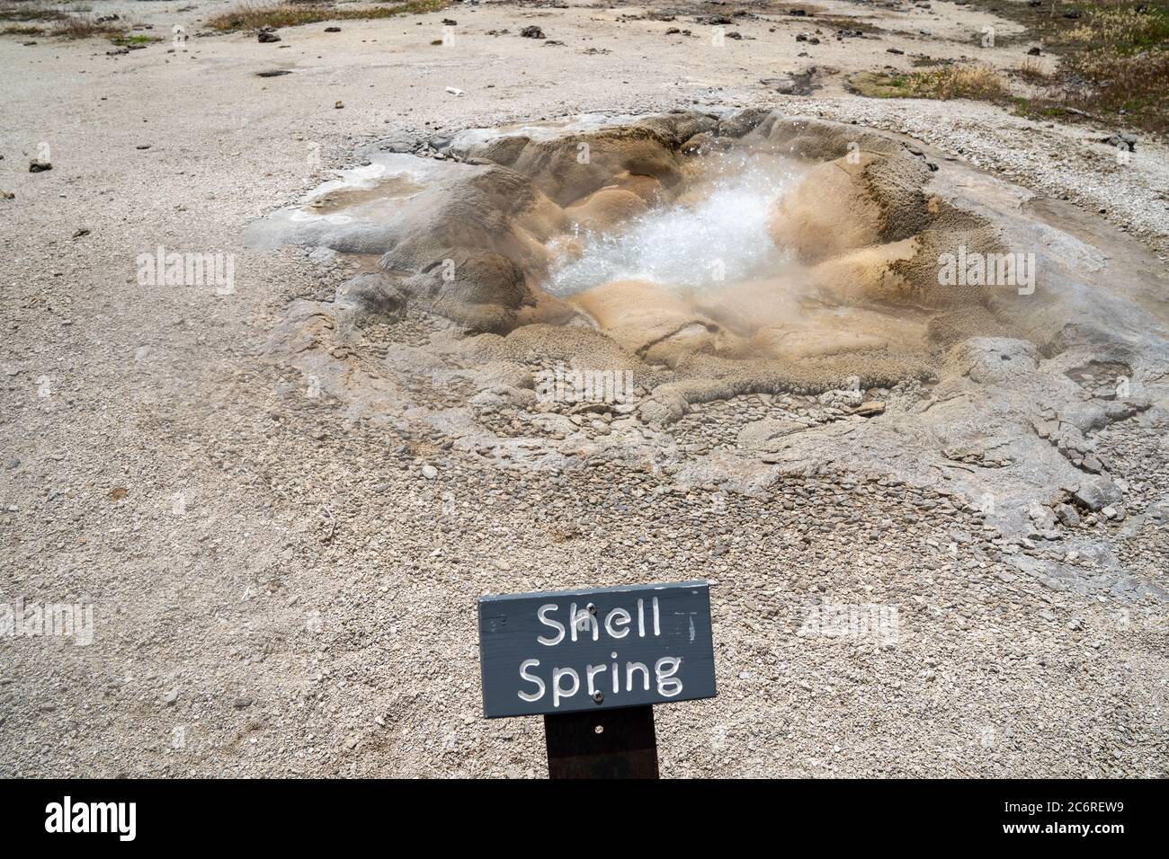 Sign for the Shell Spring, a bubbling hot spring geyser in Biscuit ...