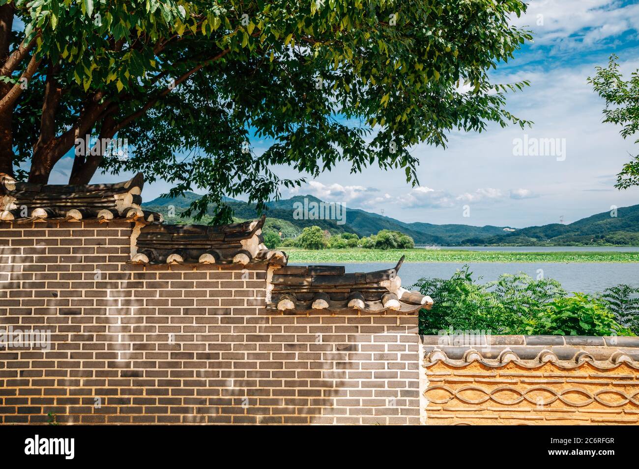 Korean traditional stone wall with river and mountain at Dumulmeori in ...