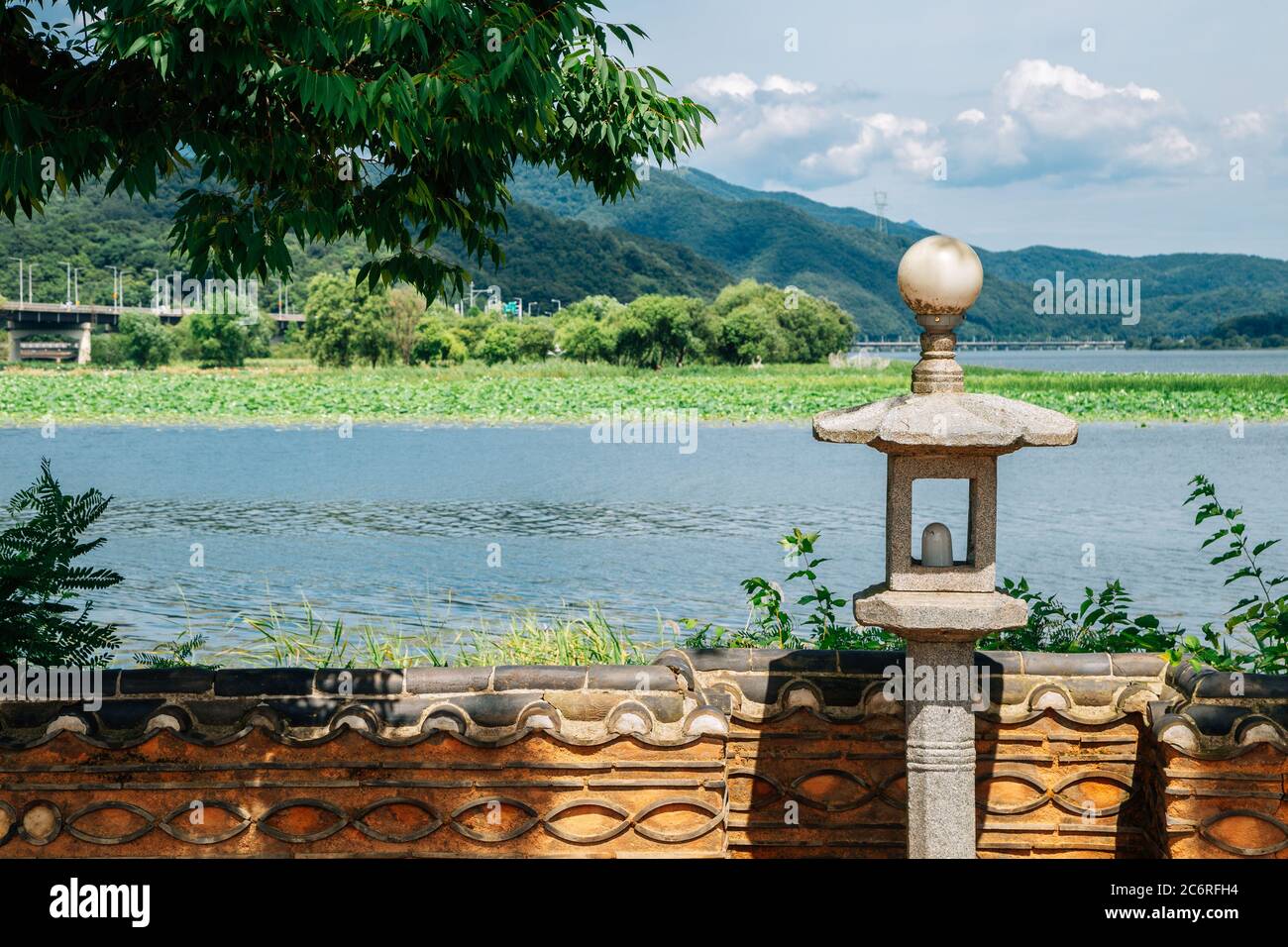 Korean traditional stone wall with river and mountain at Dumulmeori in ...