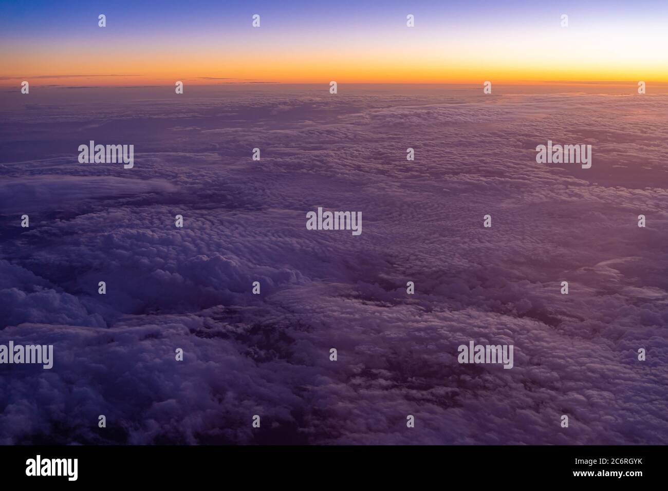 Aerial view of high altitude clouds during sunset Stock Photo - Alamy