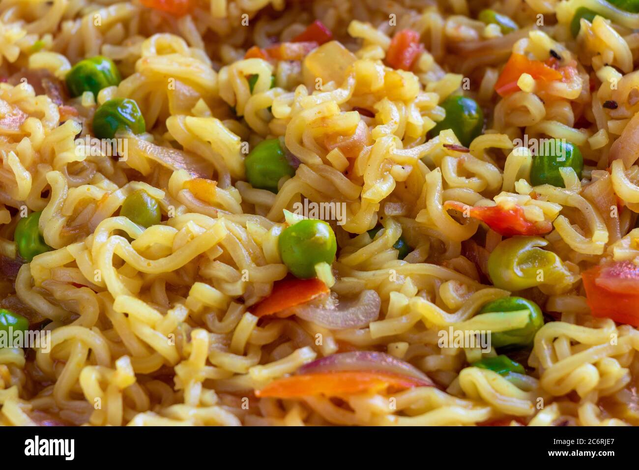 Spicy fried instant noodles, close up view Stock Photo - Alamy