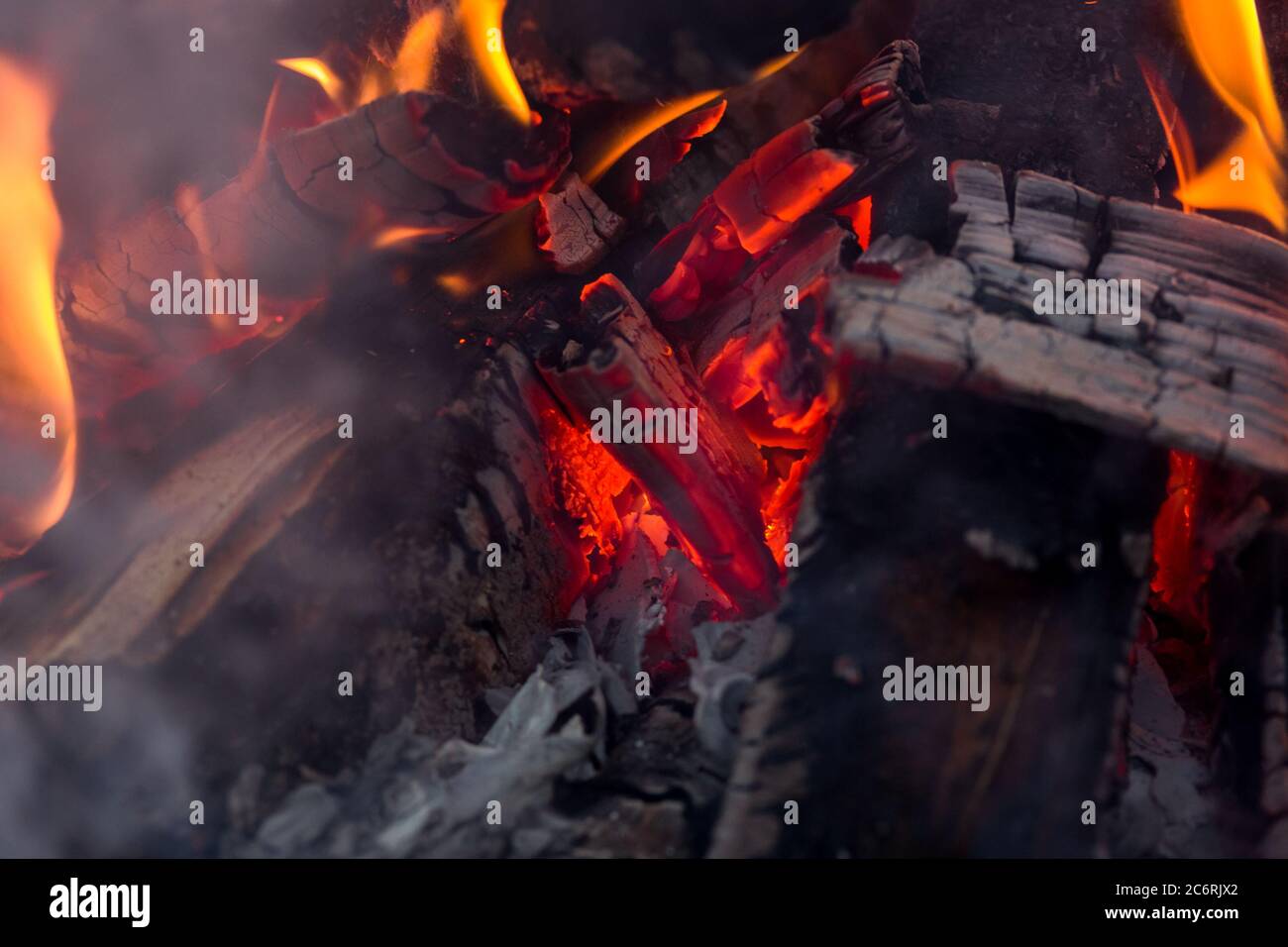 Burning charcoal in the fire for barbecue Stock Photo - Alamy