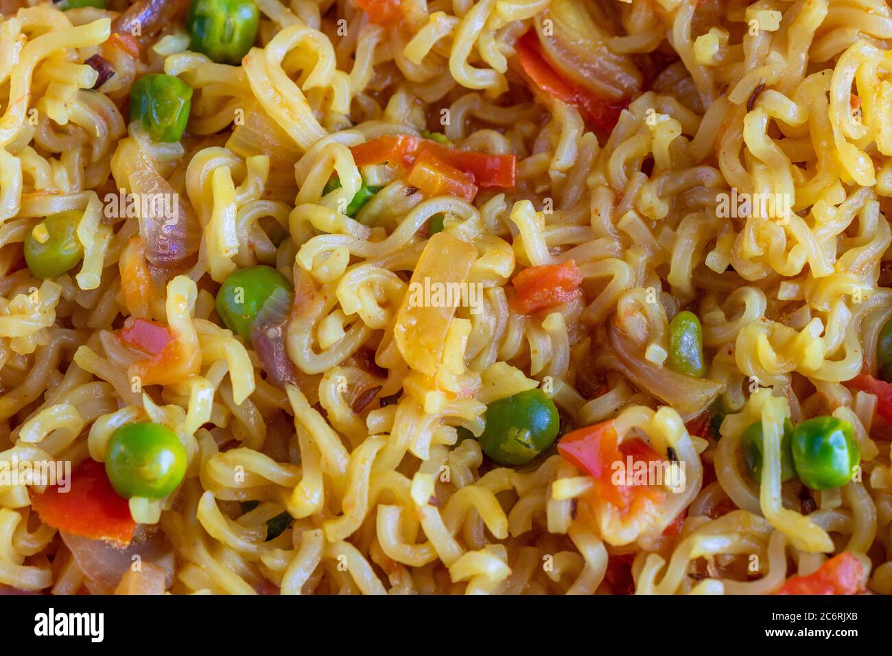Spicy fried instant noodles, close up view Stock Photo - Alamy