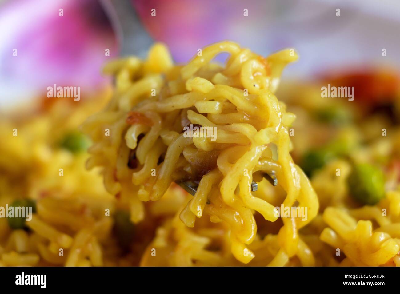 Spicy fried instant noodles, close-up with blurry backgroun Stock Photo ...