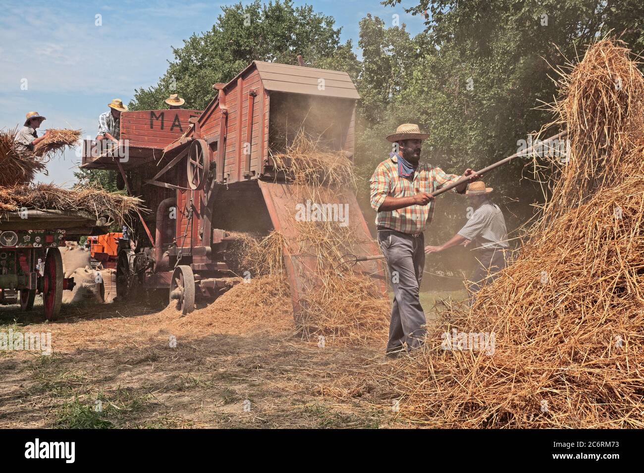 Vintage agricultural threshing machine hi-res stock photography and ...