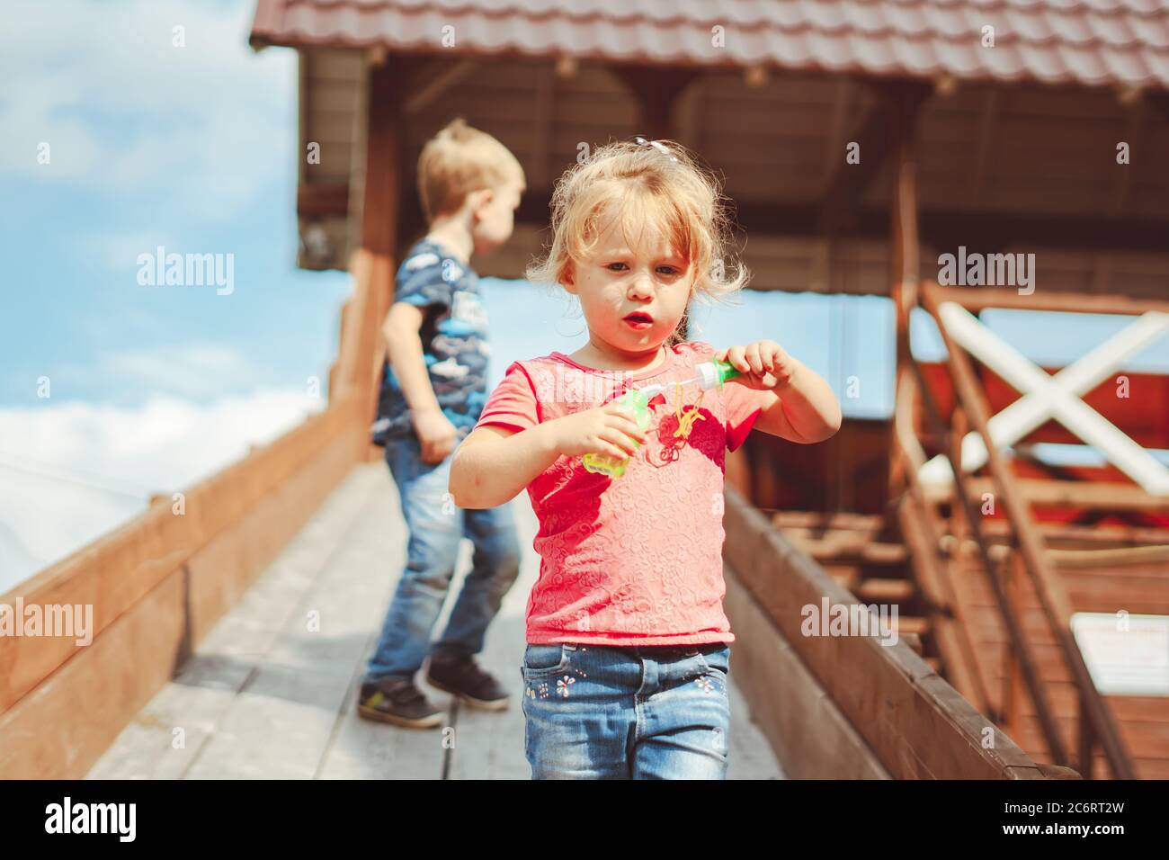 children play on the Playground run and have fun Stock Photo - Alamy