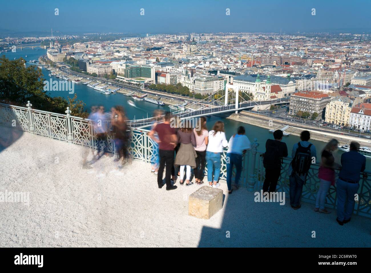 People watching panoramic city view from citadel viewing point on ...