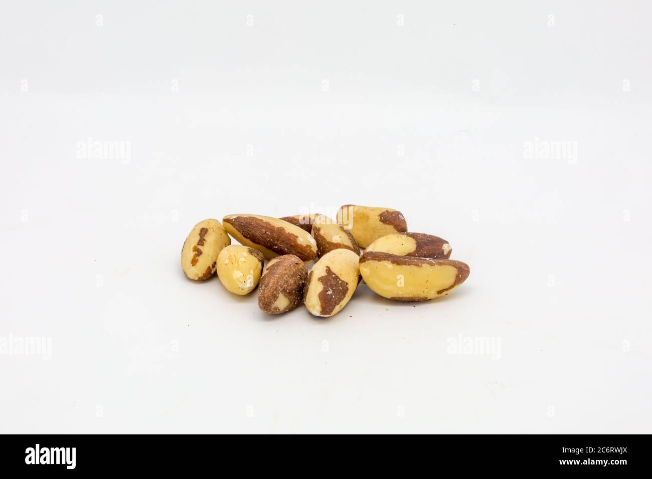 Shelled Brazil nuts against a white background Stock Photo - Alamy