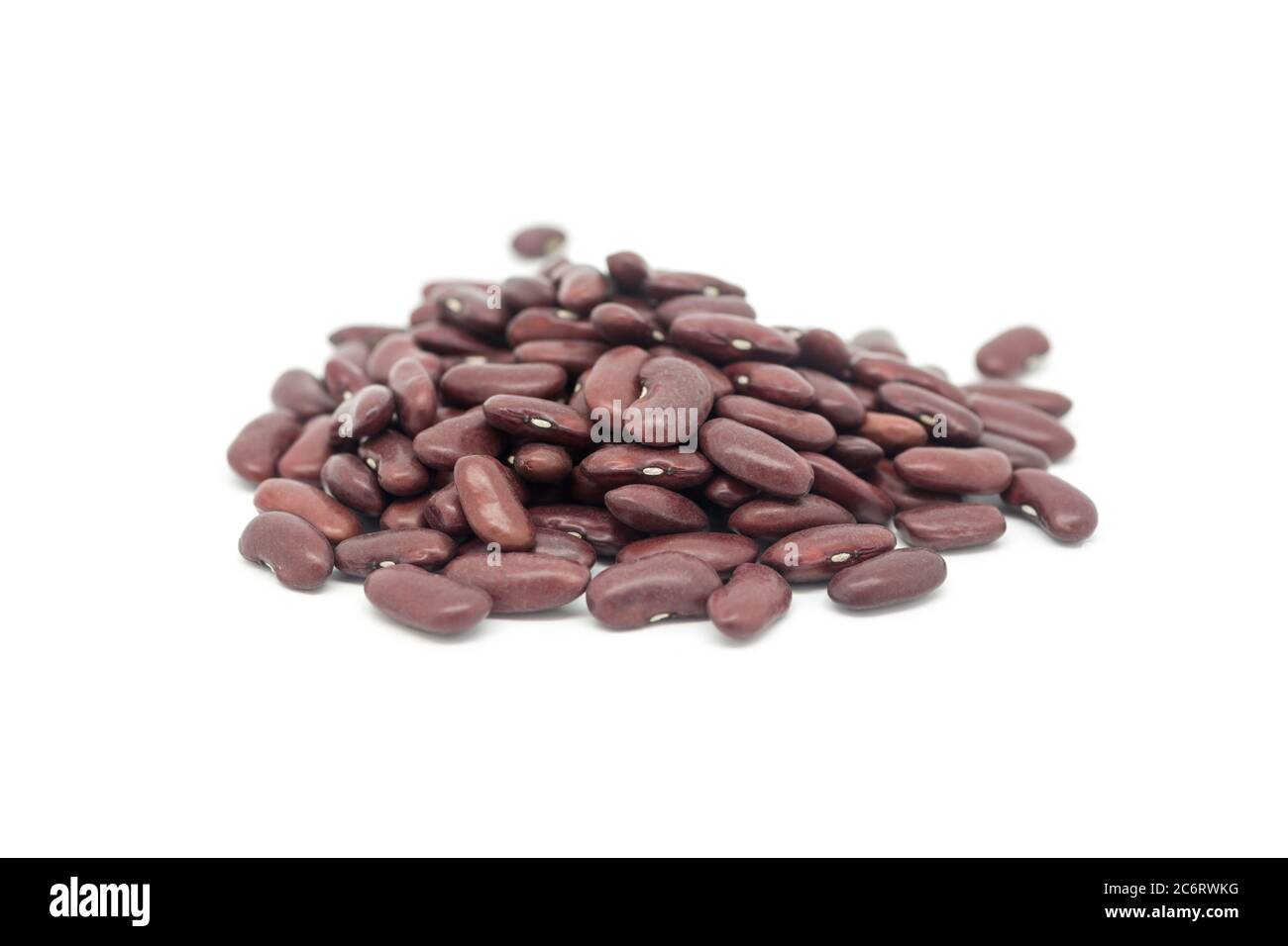 Dried red kidney beans against a white background Stock Photo - Alamy