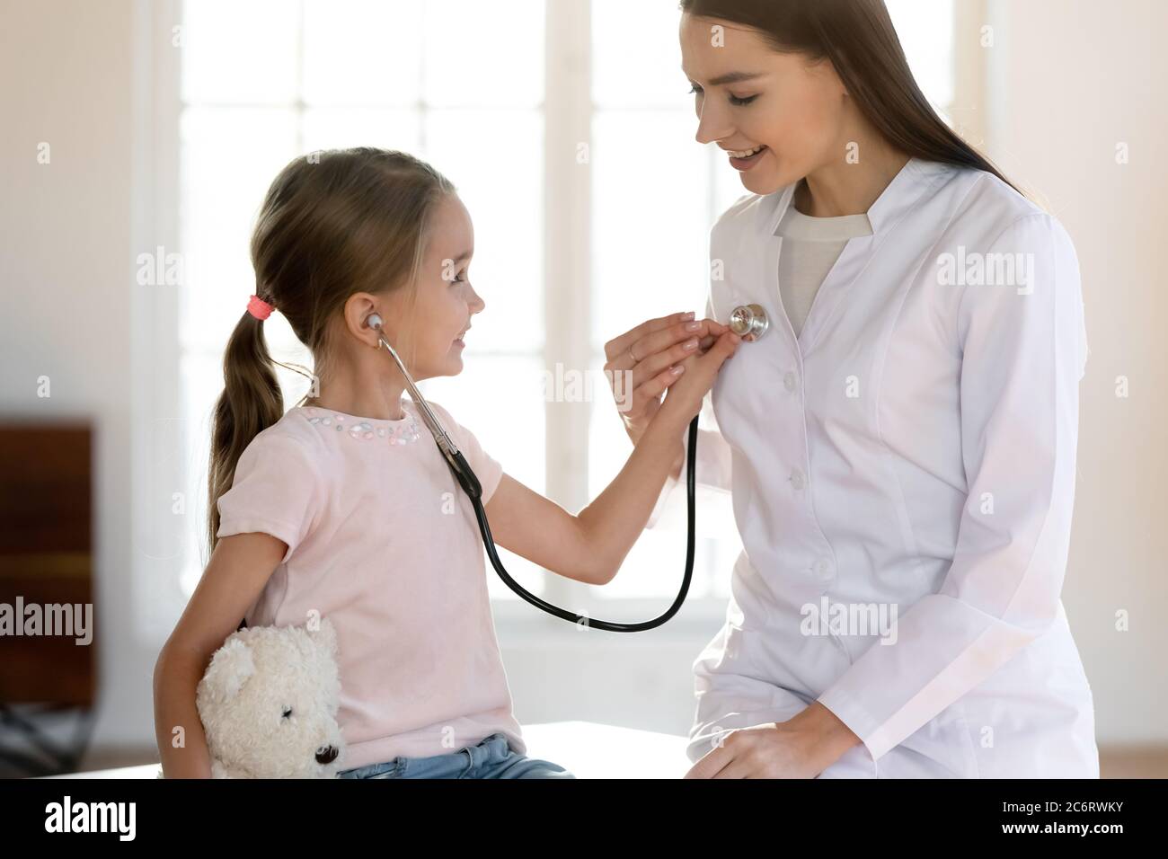 Children Playing Doctor And Patient High Resolution Stock Photography ...