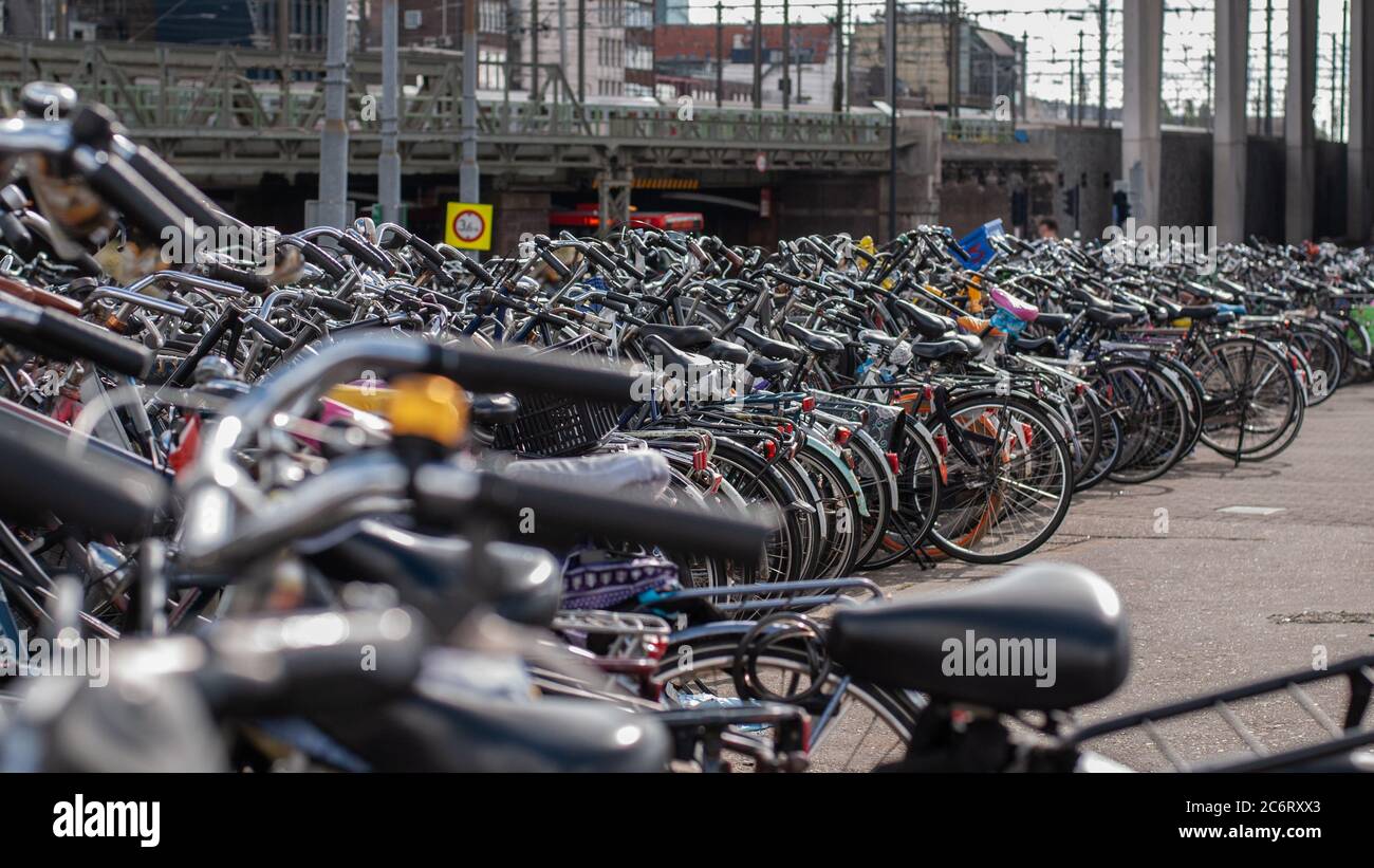 Lots of bikes in a parking lot in Amsterdam, Netherlands Stock Photo ...