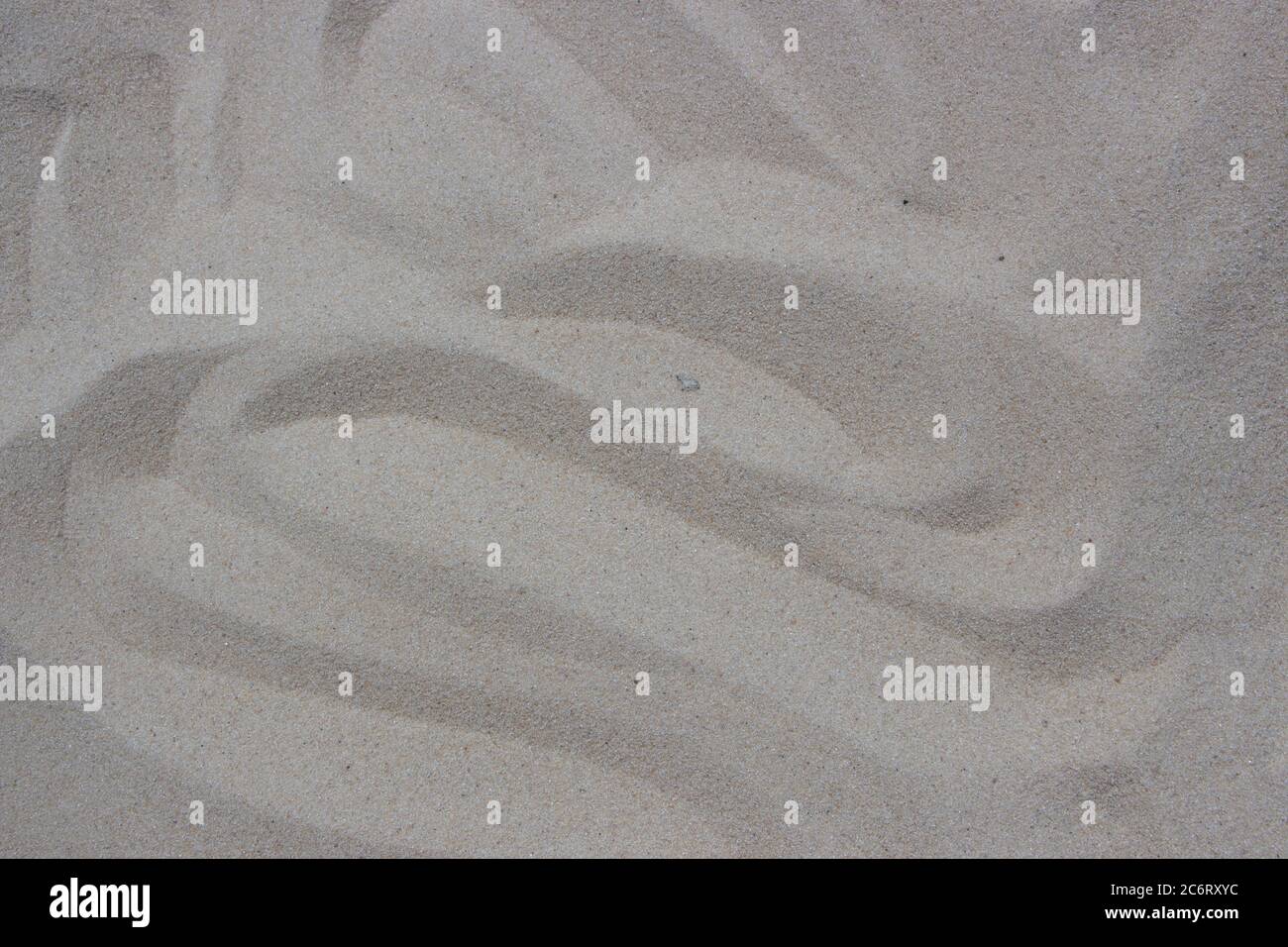 closeup of sand pattern of a beach in the summer Stock Photo - Alamy
