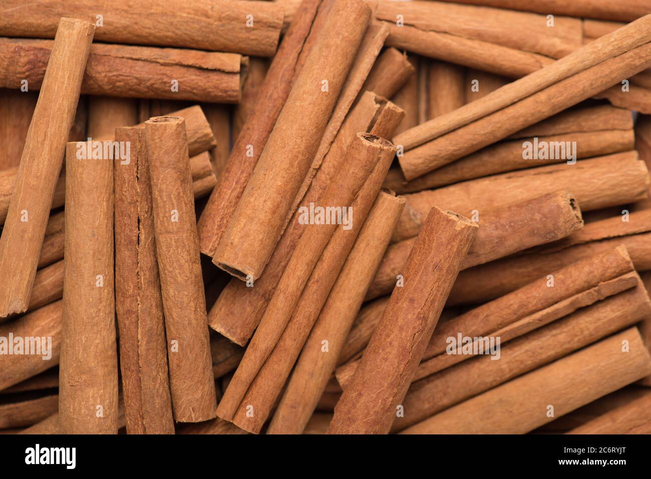 Close up macro photo of tasty cinnamon sticks background Stock Photo ...