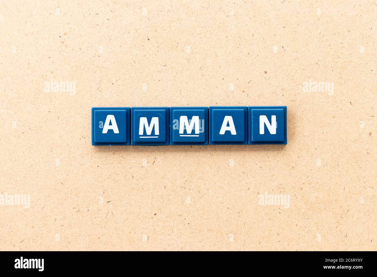 Tile letter in word Amman on wood background Stock Photo - Alamy