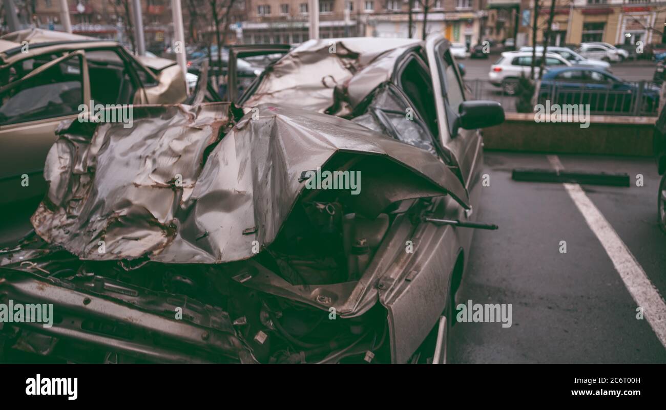 The car after the accident. Broken car on the road. The body of the car ...