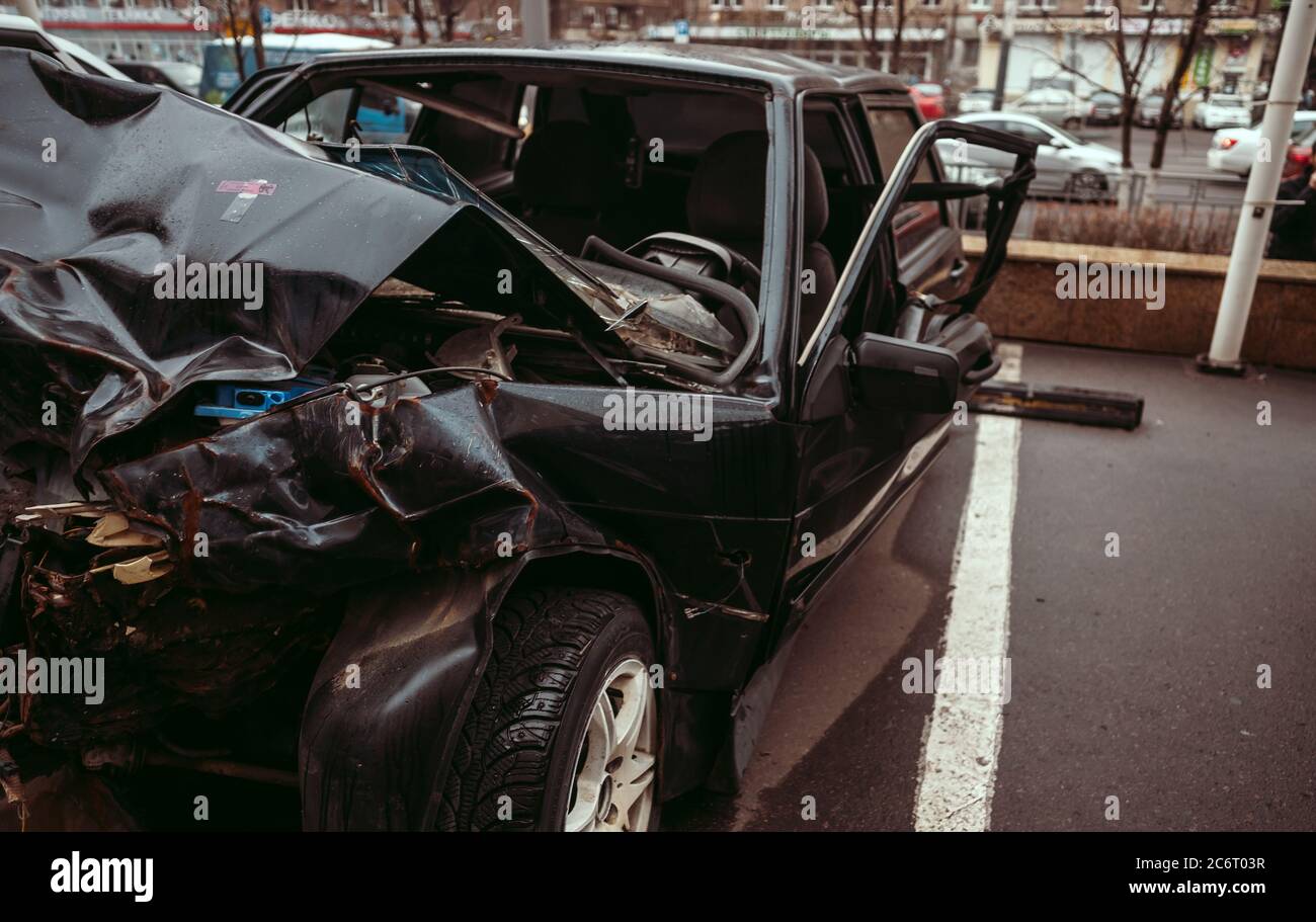 The car after the accident. Broken car on the road. The body of the car ...