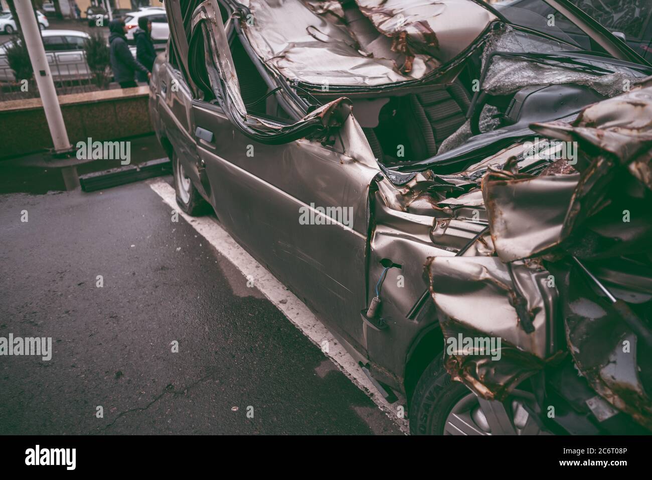The car after the accident. Broken car on the road. The body of the car ...
