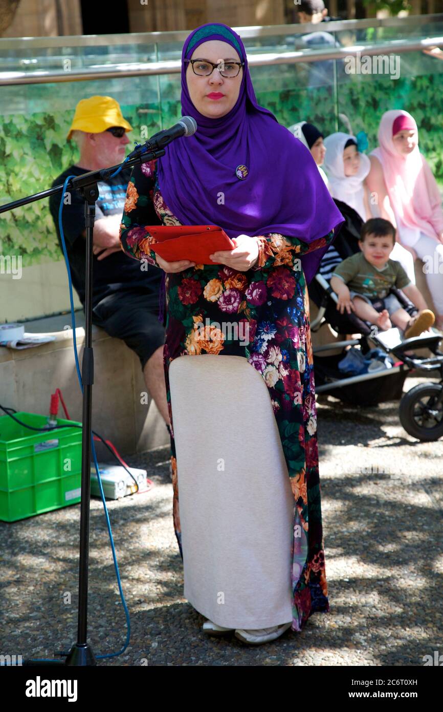 Lydia who appeared on SBS’s ‘Living with the Enemy’ speaks at the rally ...