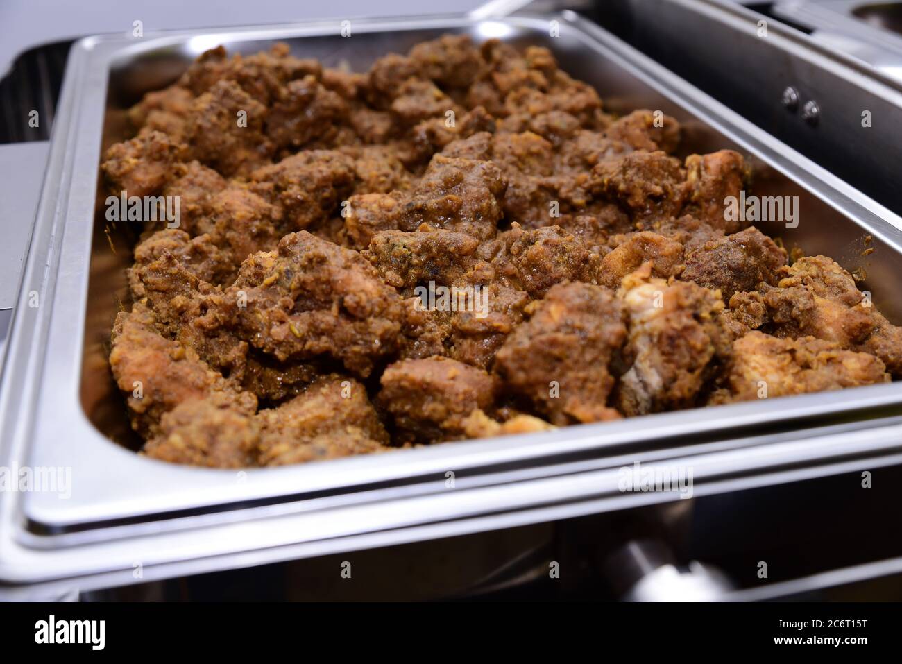 Chili Chicken at a buffet Stock Photo - Alamy