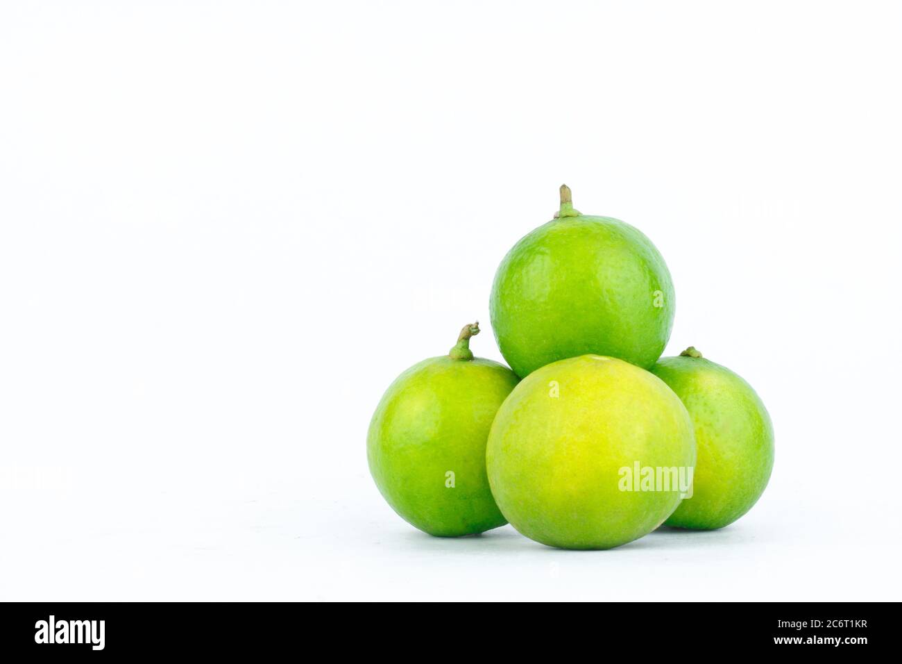 Lime fruits vegetables are used ingredient food in cooking on the white ...
