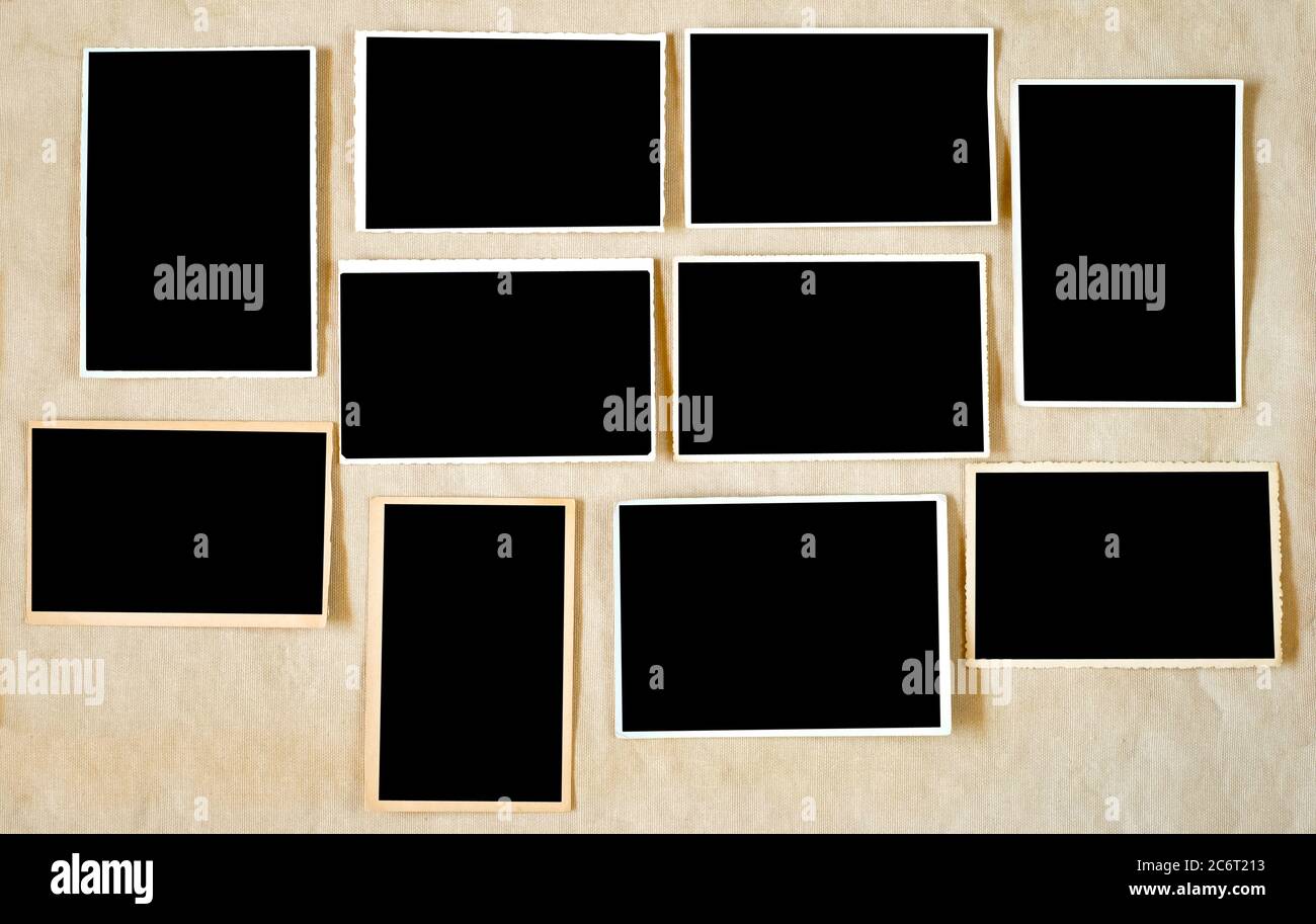 Set of vintage empty photographs,picture frames, flat lay on crumpled ...
