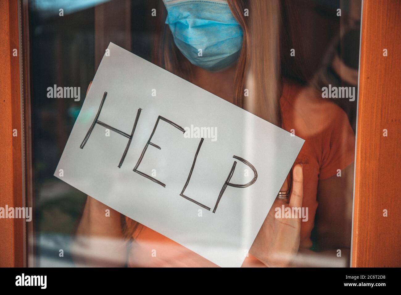 Coronavirus Covid-19 crisis quarantine. Desperate scared woman with ...
