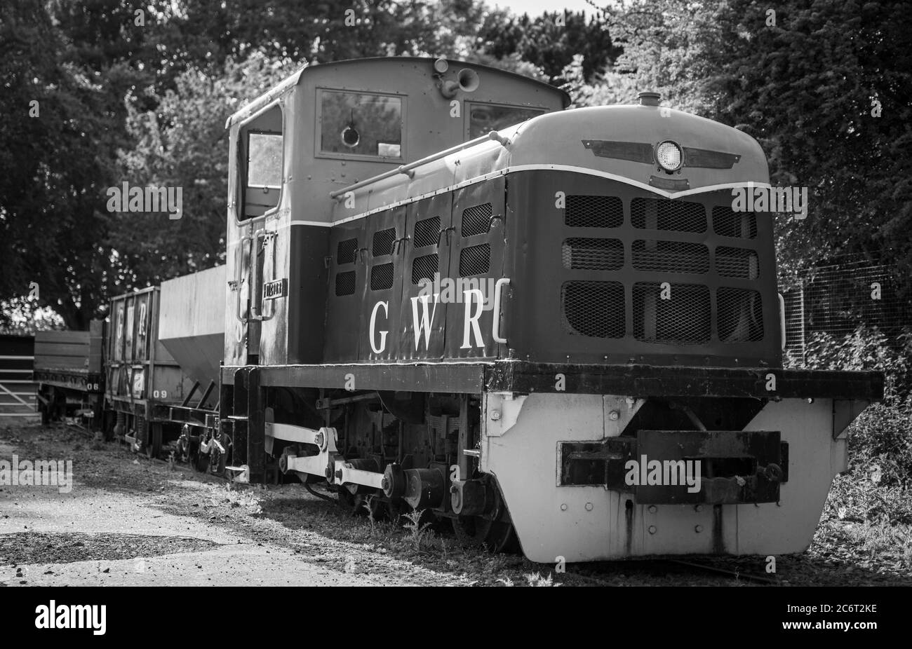 Diesel Train towing carriages in black and white Stock Photo - Alamy
