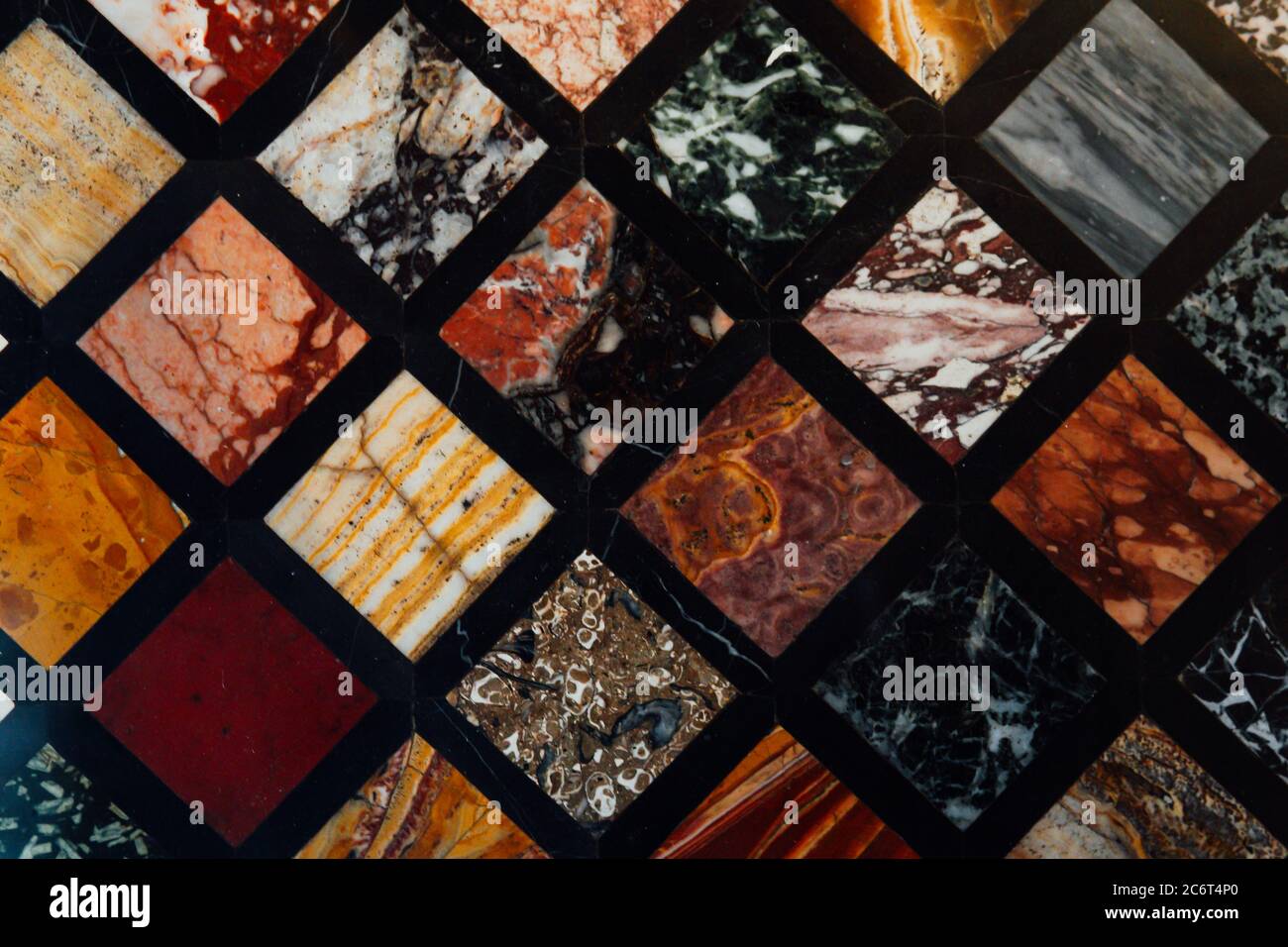 Old vintage wall with multicolored marble squares textured background ...
