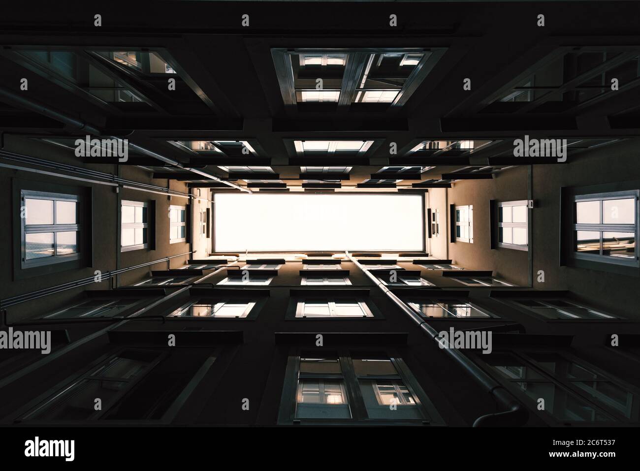 Rectangle sky view from the bottom of the small courtyard between the ...