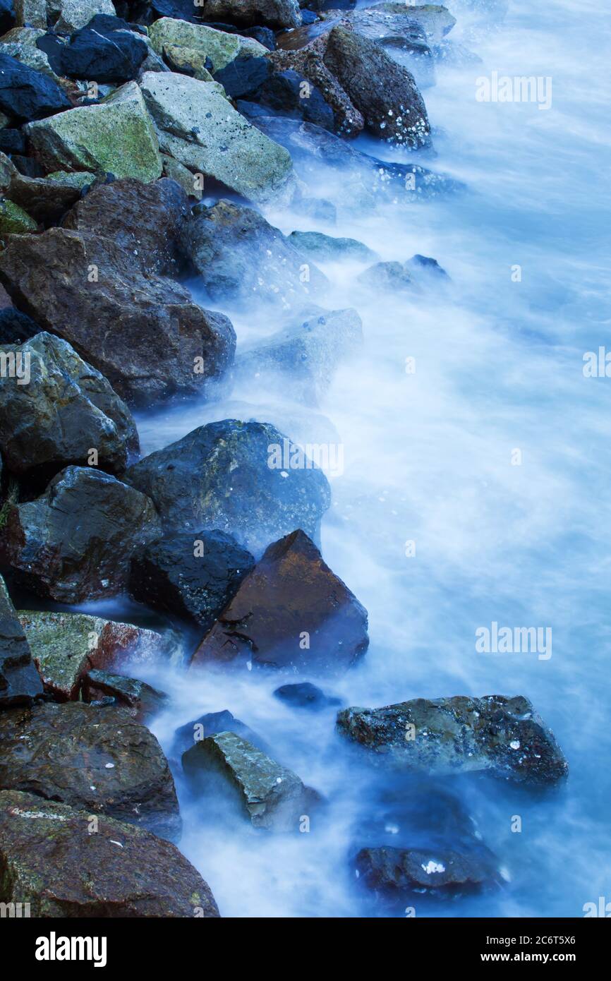 Stones breakwater fight against a coastal erosion, close of breakwater ...