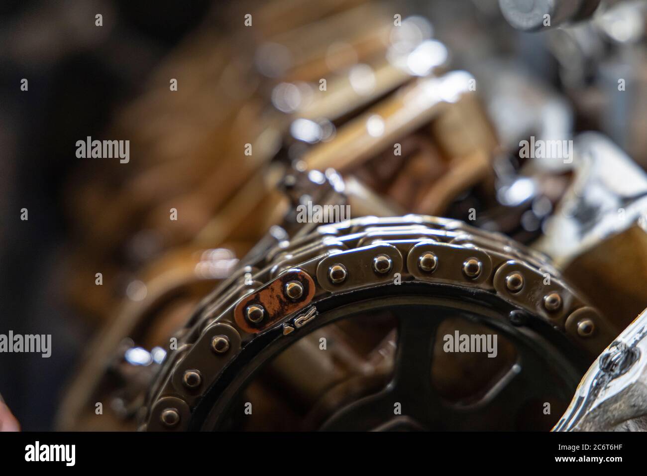 Close up chain camshaft timing of engine on blur camshaft backgrpound ...